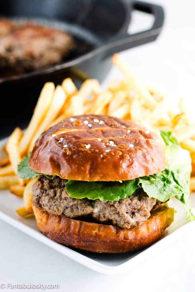 Easy Blue Cheese Burgers Recipe on a Pretzel Bun